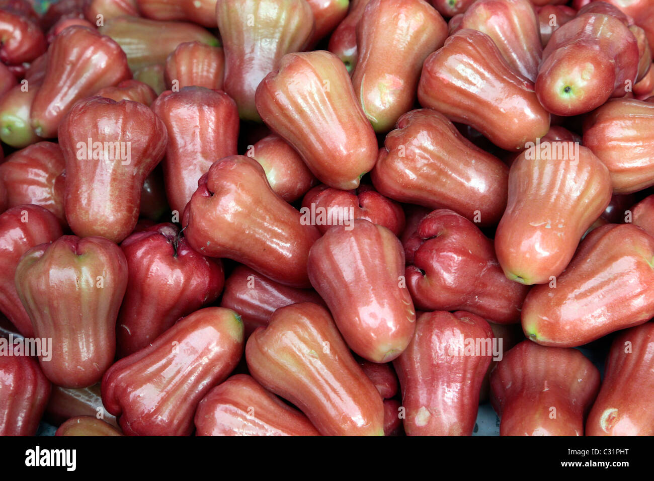 STALL OF ROSE APPLES OR WATER APPLES (SYZYGIUM JAMBOS), TROPICAL FRUIT ...