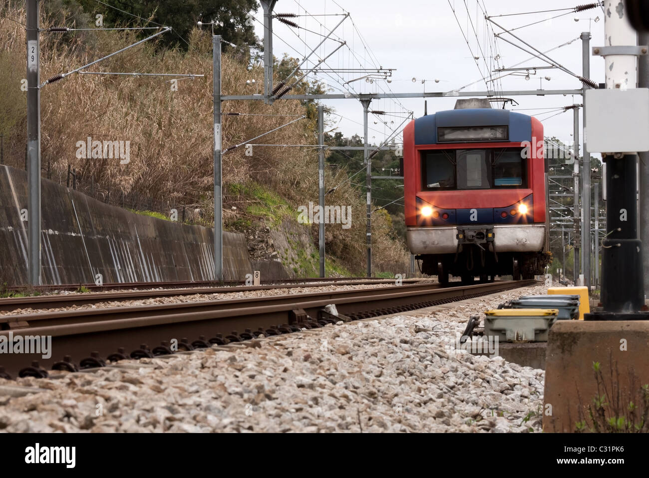 Front view of a moving train on a cloudy day Stock Photo - Alamy