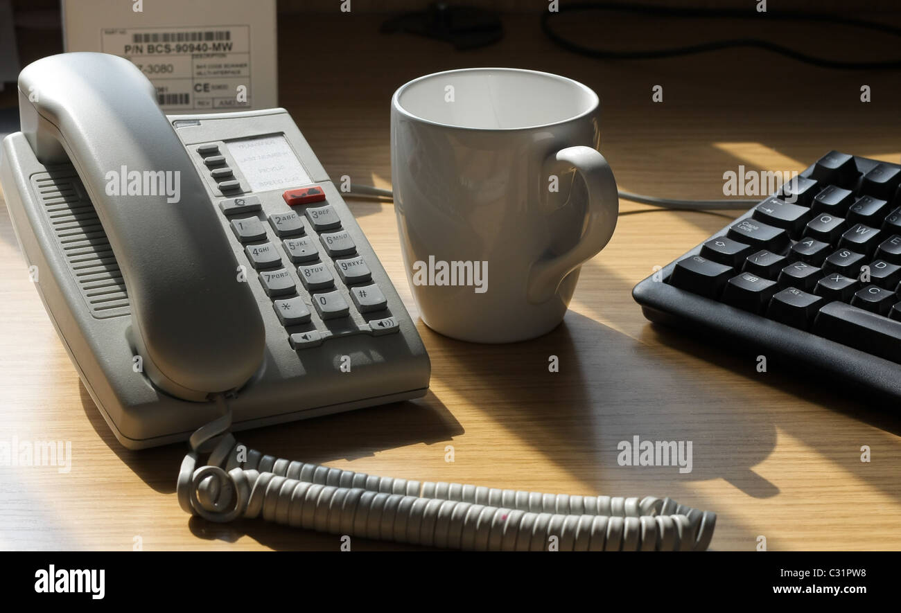 Everyday office desk scene Stock Photo - Alamy