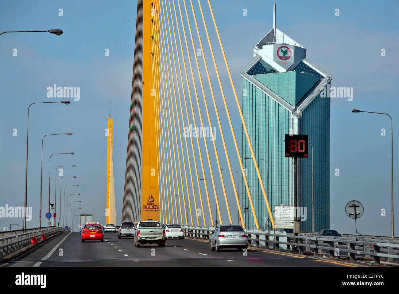 NEW MOTORWAY CROSSING THE YELLOW RAMA IX BRIDGE FOR EXITING THE CITY ...