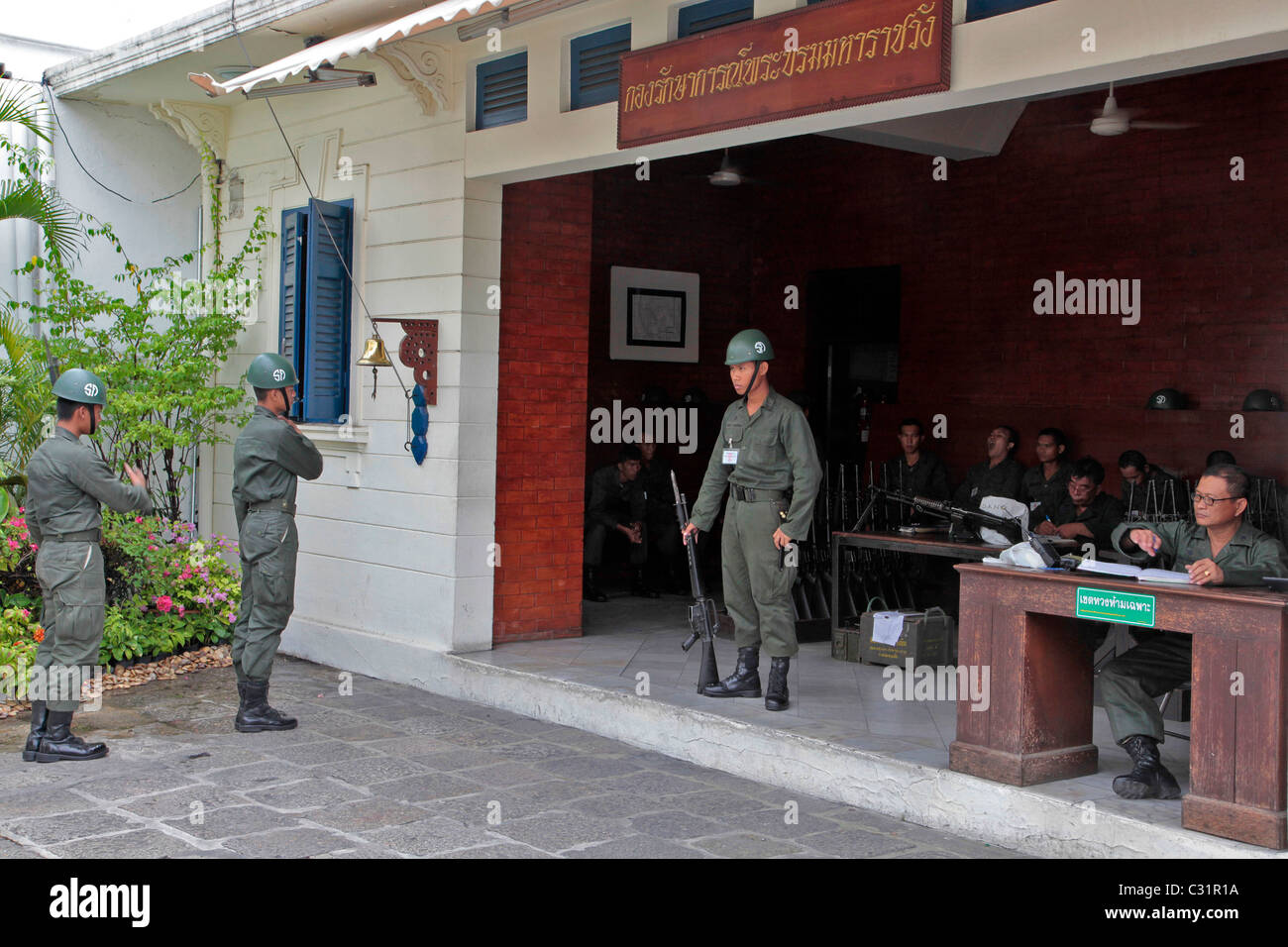 SOLDIERS IN THE GUARDS’ POST, ENTRANCE TO THE ROYAL GRAND PALACE OF ...