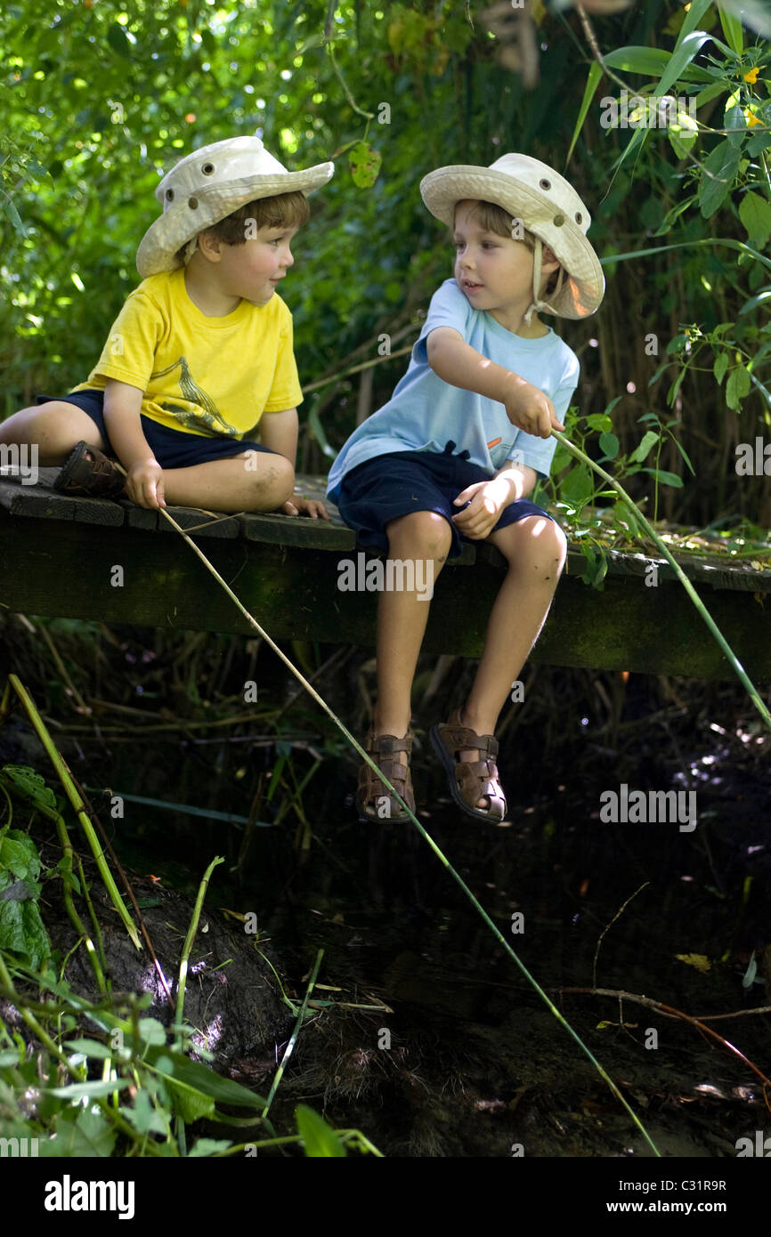 3 boys fishing hi-res stock photography and images - Alamy