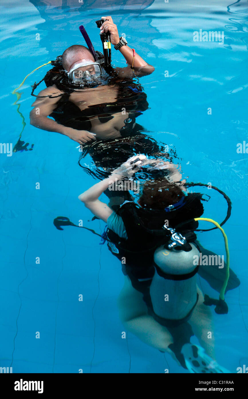 DIVING LESSONS WITH A MONITOR IN THE SWIMMING POOL AT THE CORAL HOTEL ...
