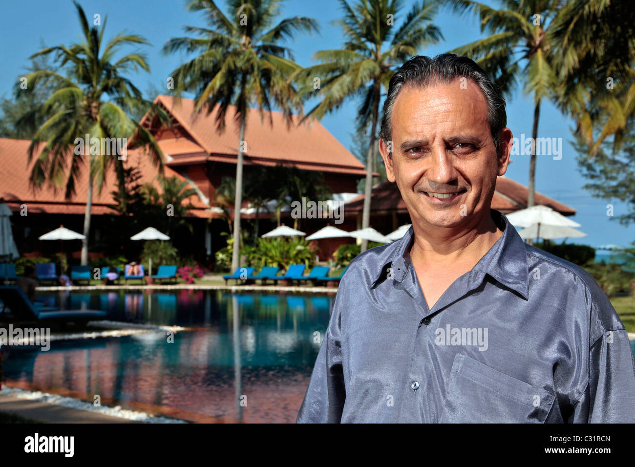 CLAUDE BOUCHER, MANAGER OF THE CORAL HOTEL, A FRENCH-RUN HOTEL, BANG ...