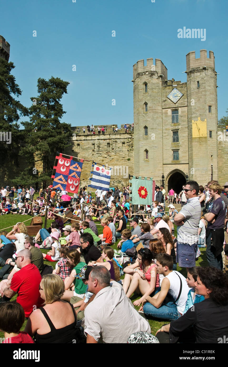 Visitors enjoying a show at Warwick Castle, England Stock Photo - Alamy