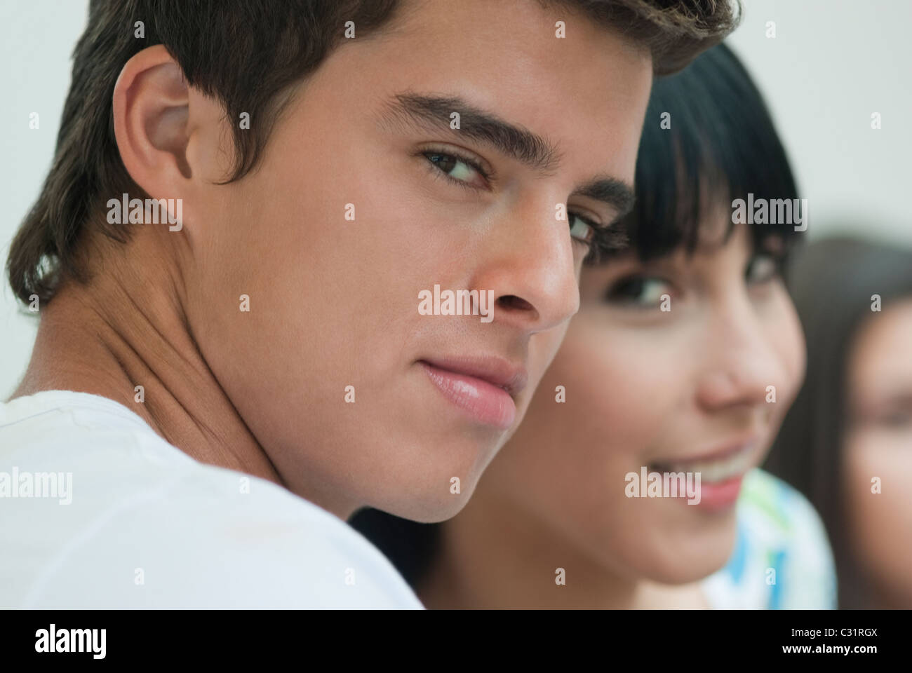 Hispanic friends hanging out together Stock Photo - Alamy