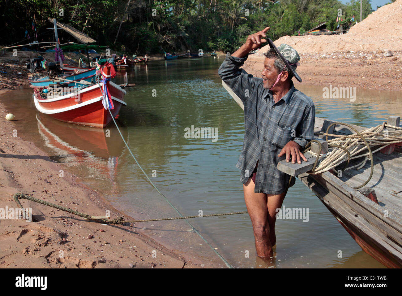 FISHERMAN IN A SMALL FISHING PORT, REGION OF BANG SAPHAN, THAILAND ...