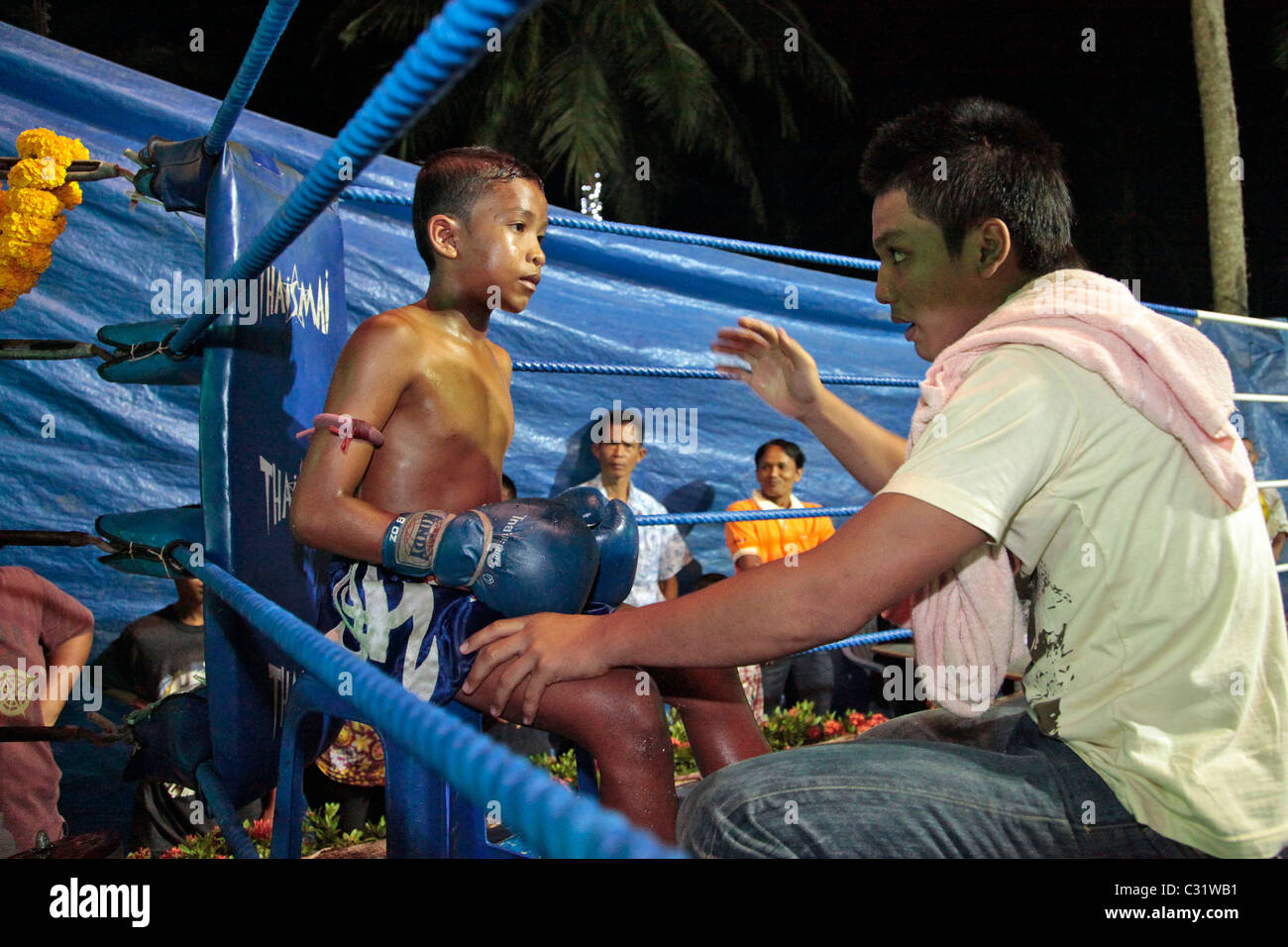 THAI BOXING MATCH IN THE EVENING AT THE CORAL HOTEL, BANG SAPHAN ...