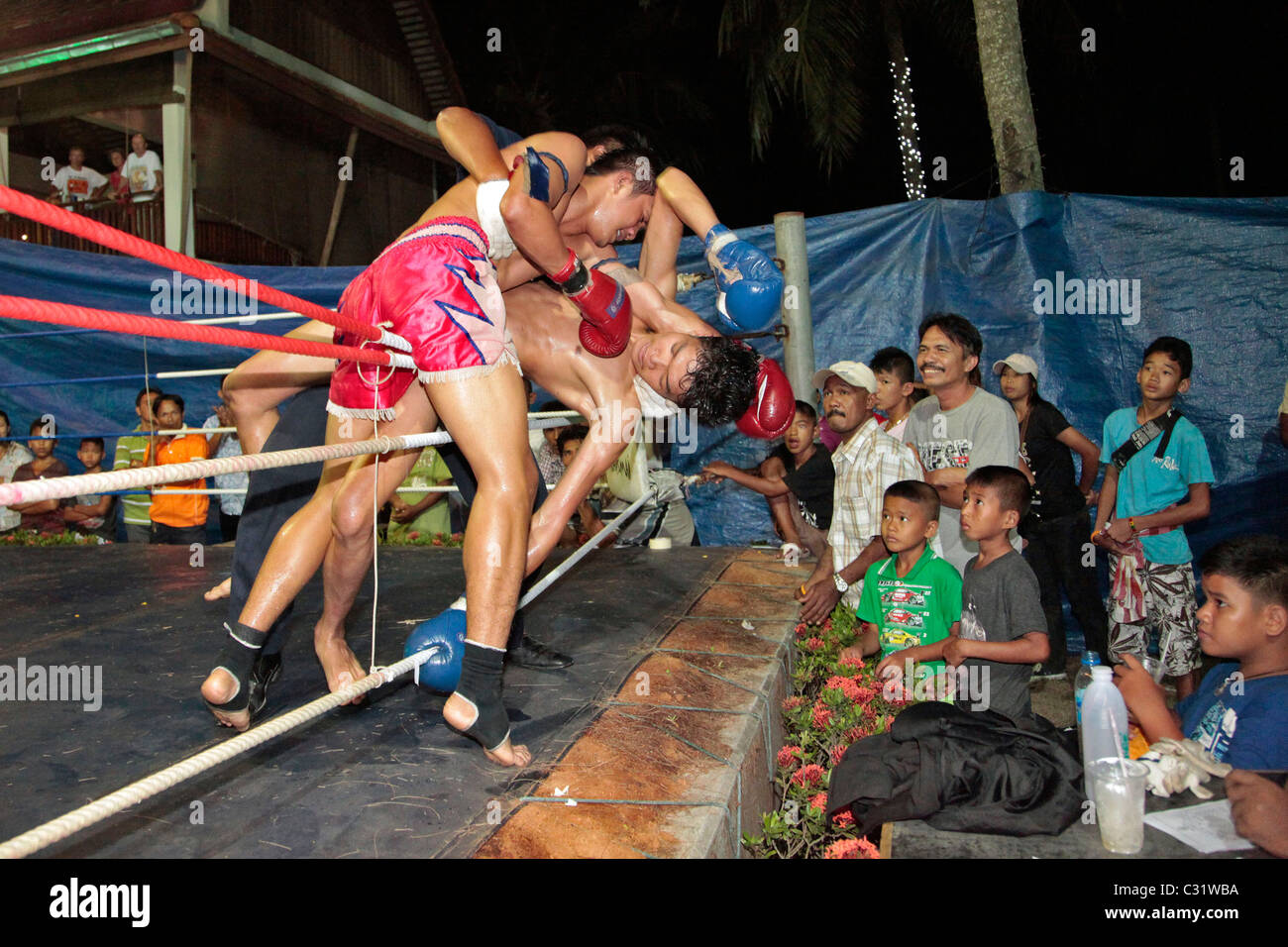THAI BOXING MATCH IN THE EVENING AT THE CORAL HOTEL, BANG SAPHAN ...
