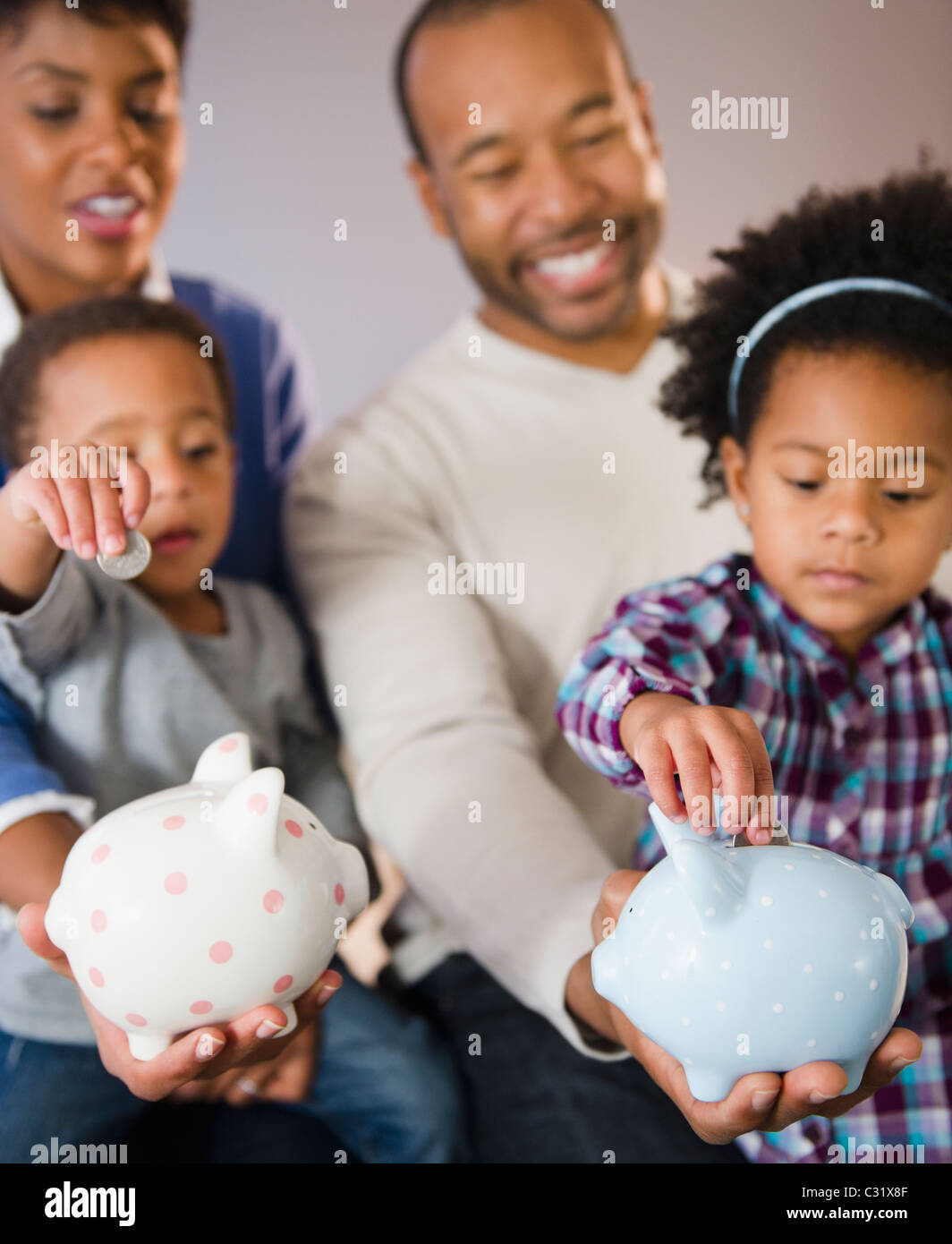 Couple with children in bank hi-res stock photography and images - Alamy