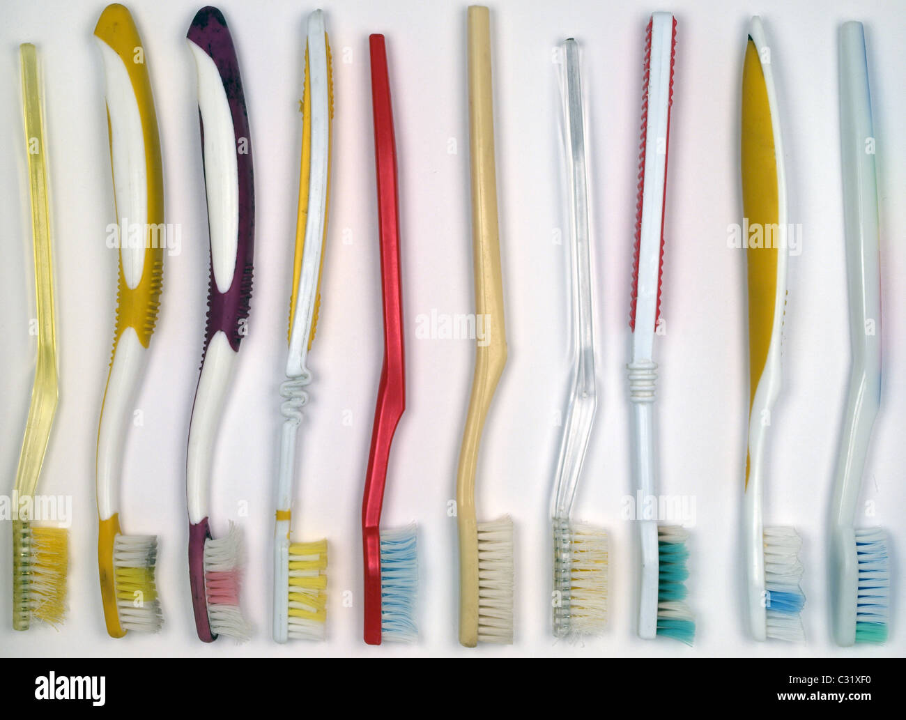Old toothbrushes of various colour, the size and the form Stock Photo ...