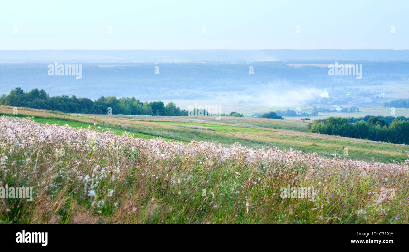 Summer countryside landscape with village on valley Stock Photo - Alamy