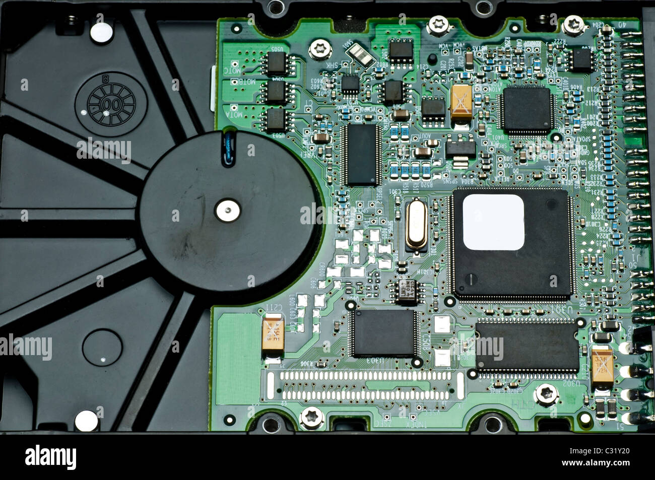computer hard disk closeup to a circuit board Stock Photo - Alamy