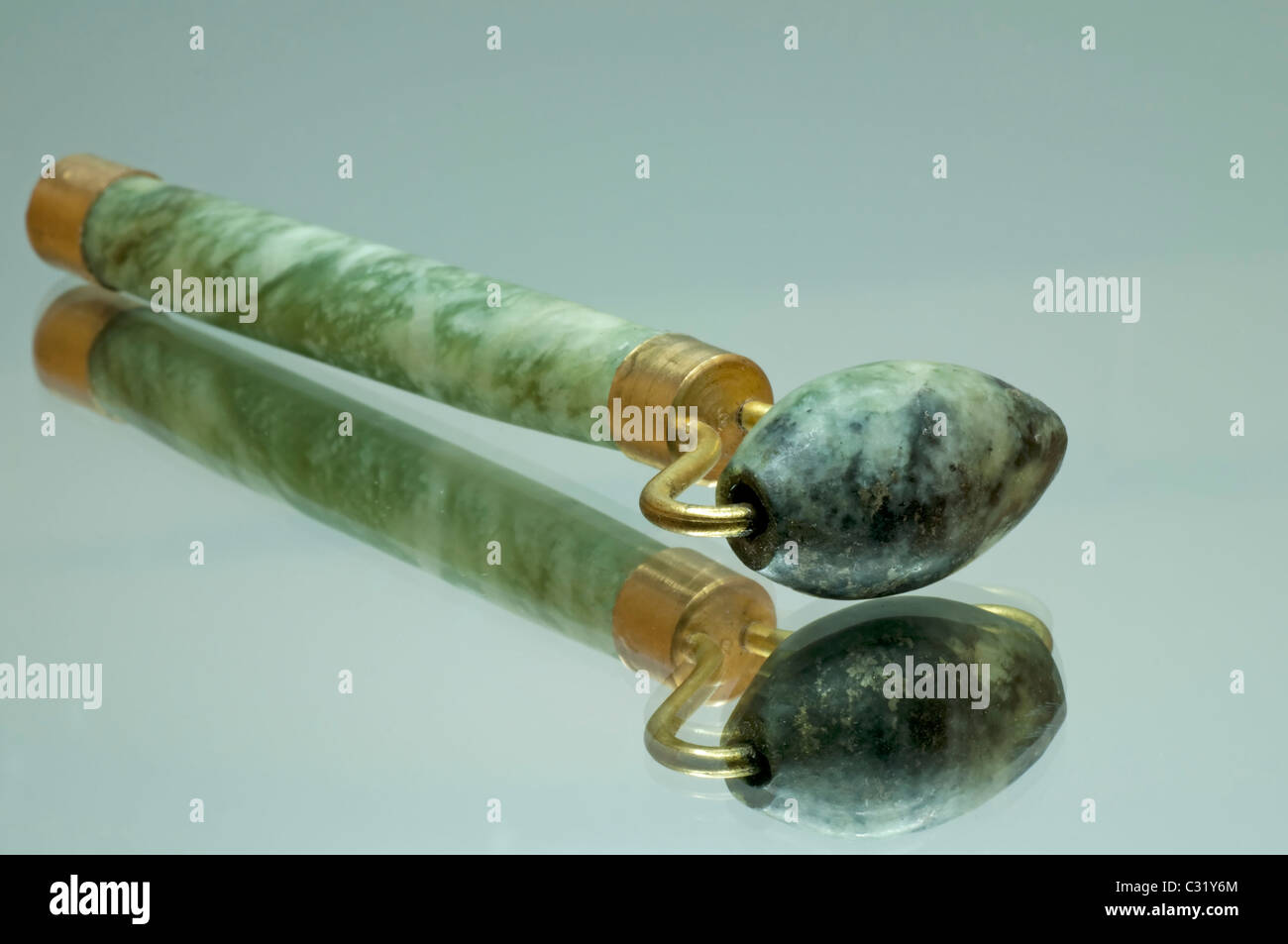massage tool made of jade Stock Photo - Alamy