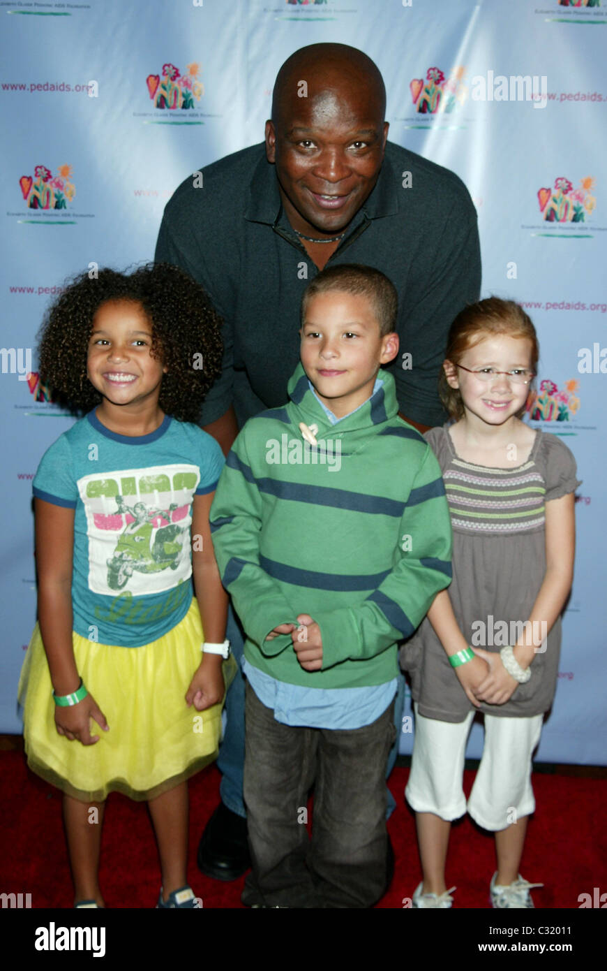 Howard Cross and Family attending the 'Kids For Kids Carnival' to ...
