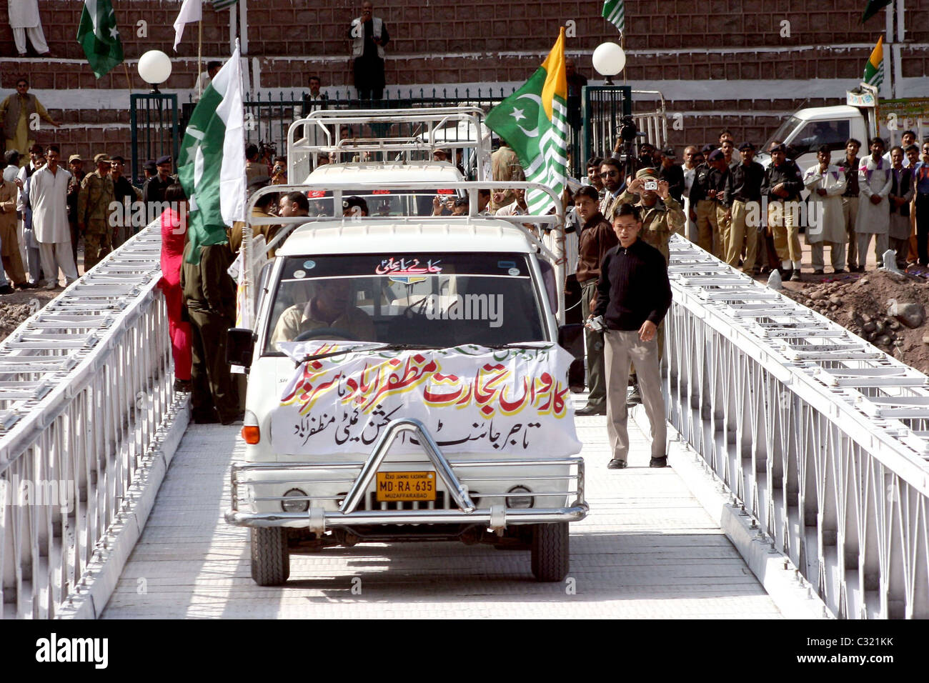 Trucks loaded with apples, onions and nuts crossed the Kaman Bridge ...