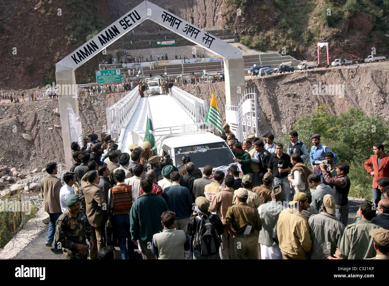 Trucks loaded with apples, onions and nuts crossed the Kaman Bridge ...
