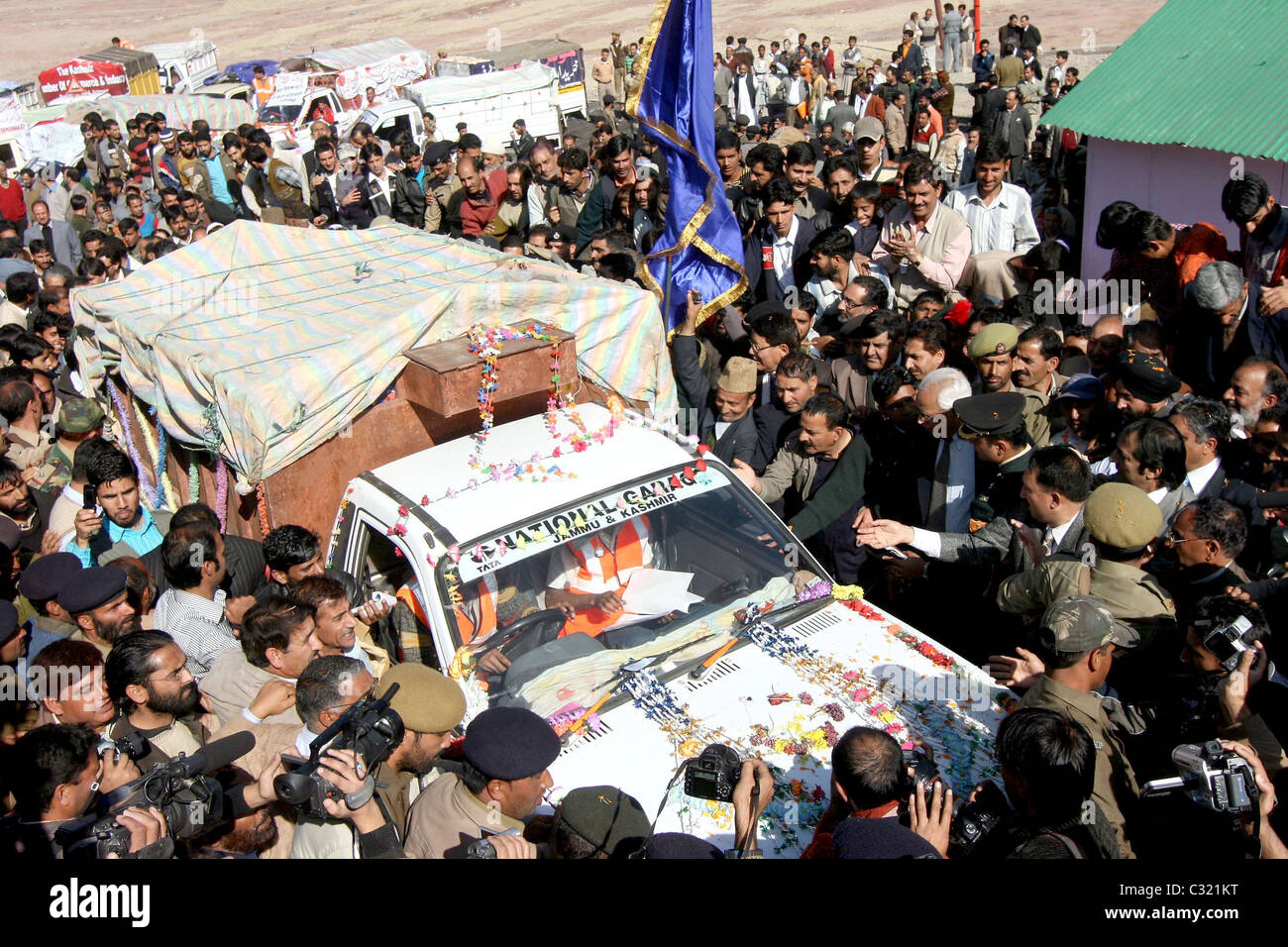 Trucks loaded with apples, onions and nuts crossed the Kaman Bridge ...