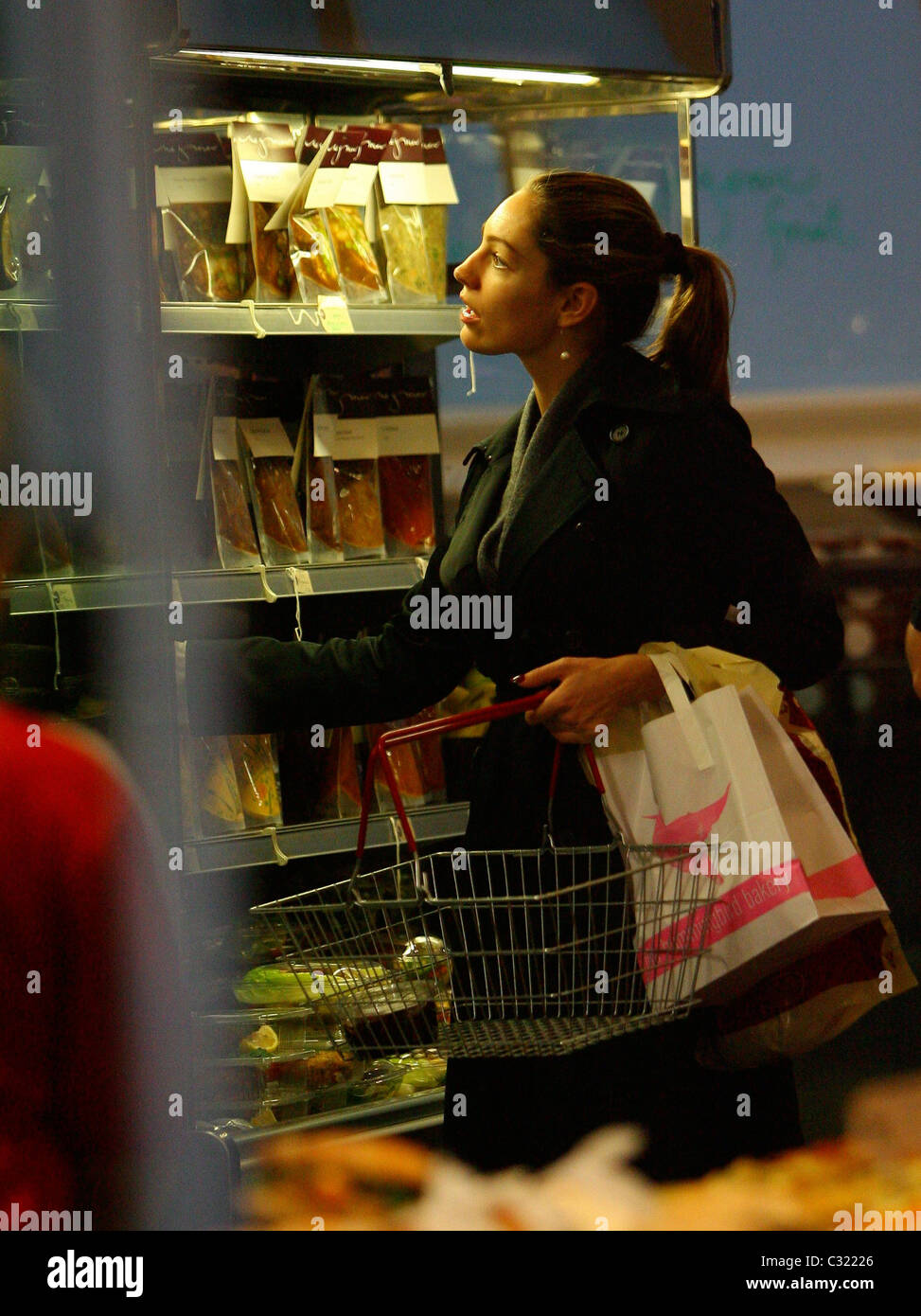 Kelly Brook shops with a friend on Portobello Road in West London ...