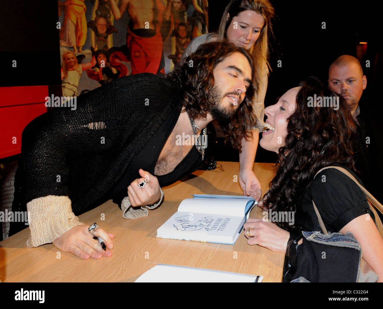 Russell Brand at a photocall for his book 'Articles of Faith' held at ...