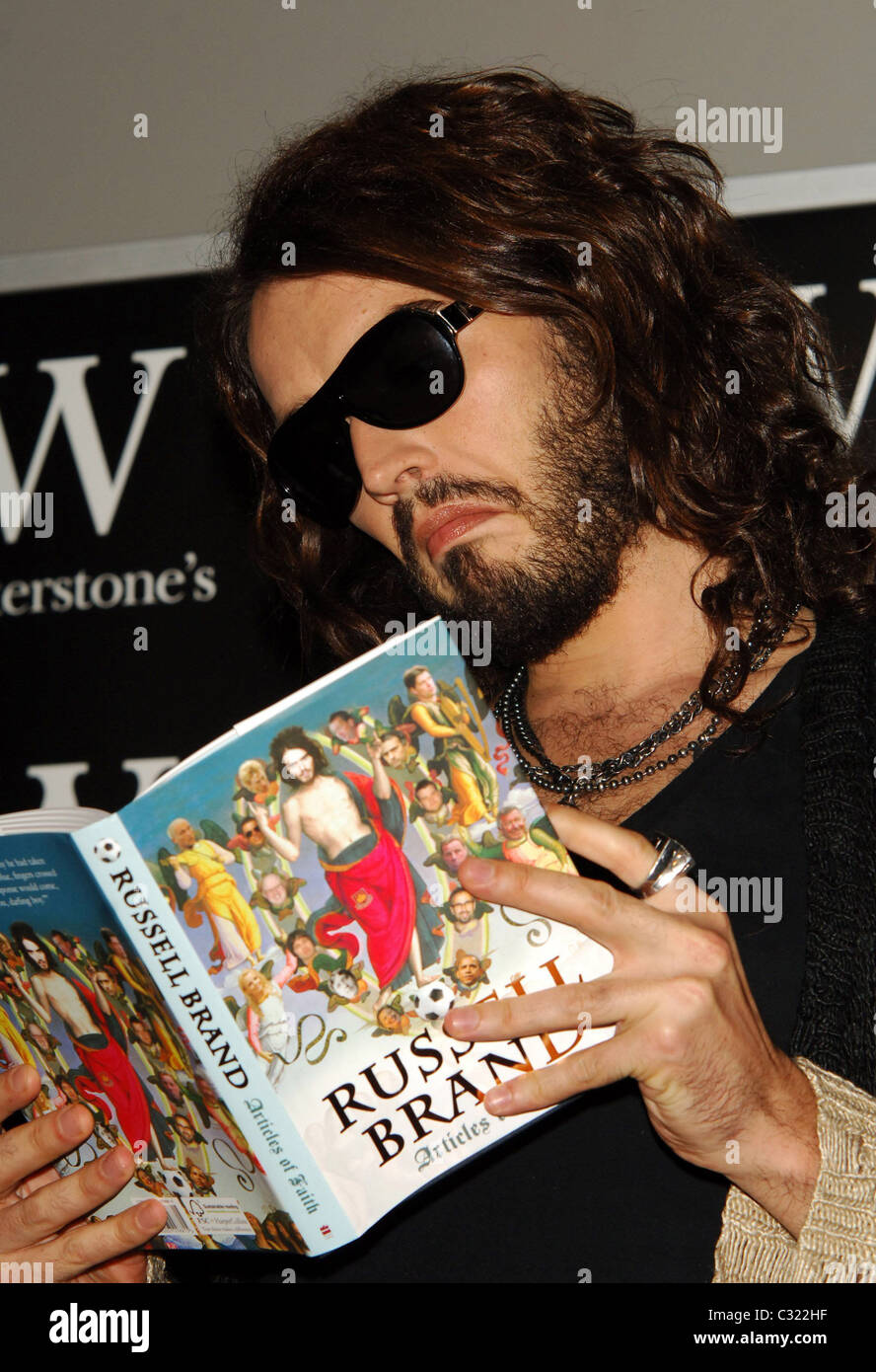 Russell Brand at a photocall for his book 'Articles of Faith' held at ...