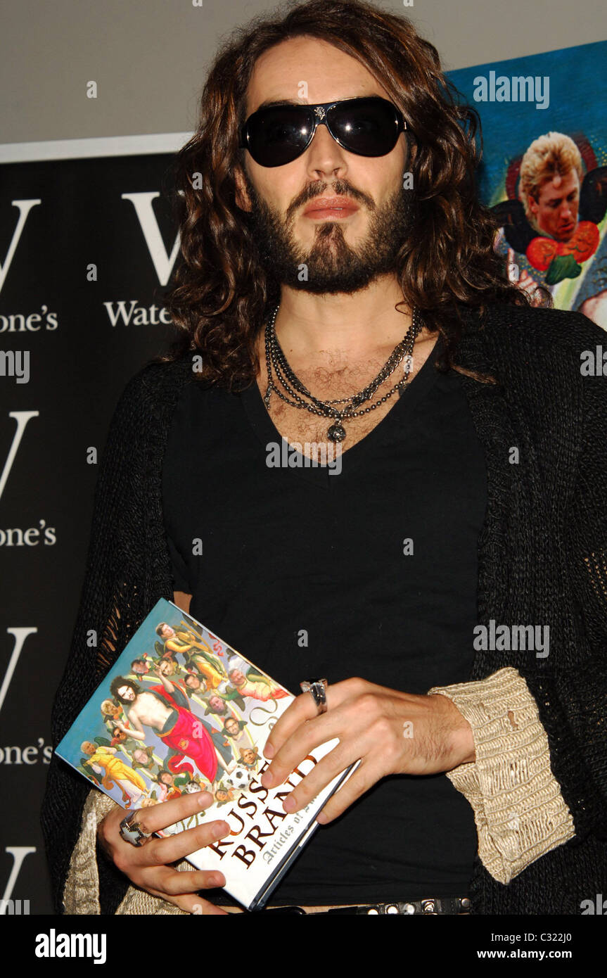 Russell Brand at a photocall for his book 'Articles of Faith' held at ...