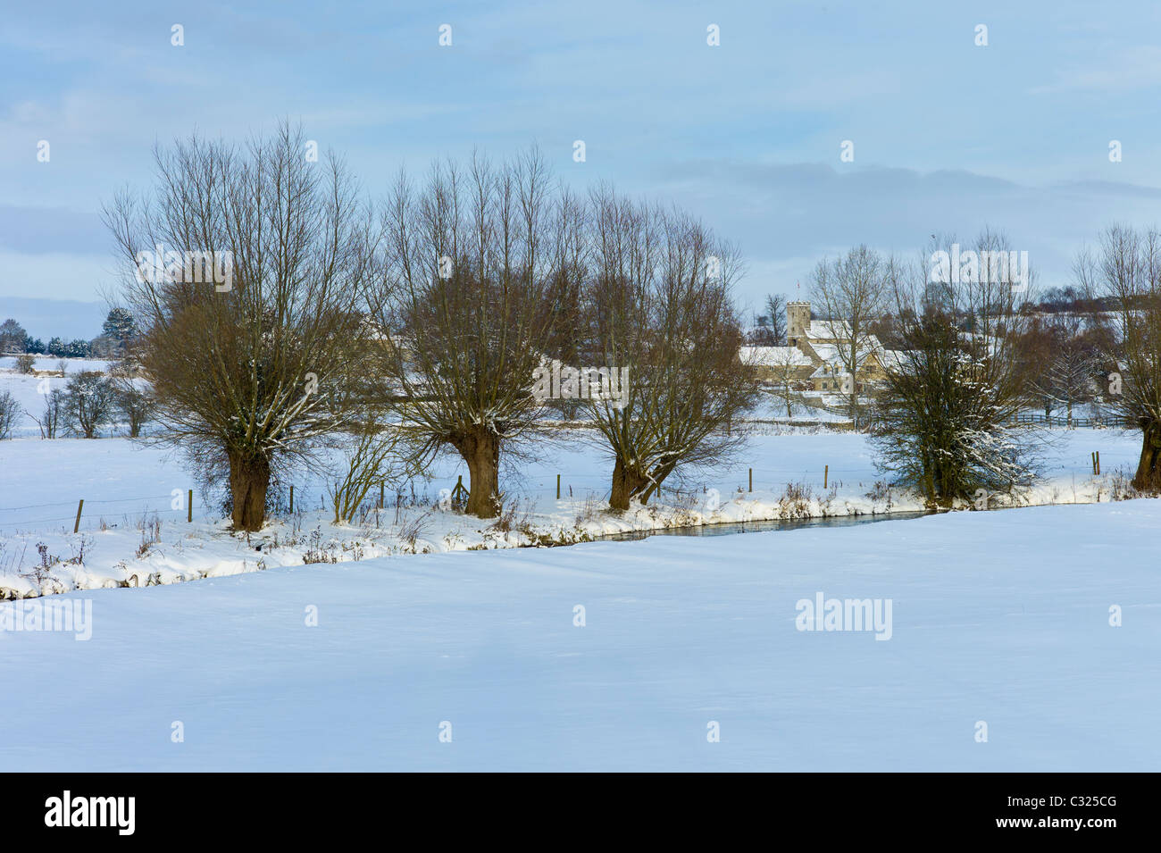 Village church snowy fields hi-res stock photography and images - Alamy