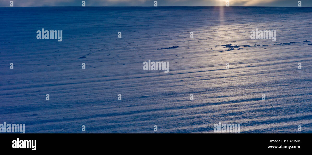 Sun setting above snow hi-res stock photography and images - Alamy