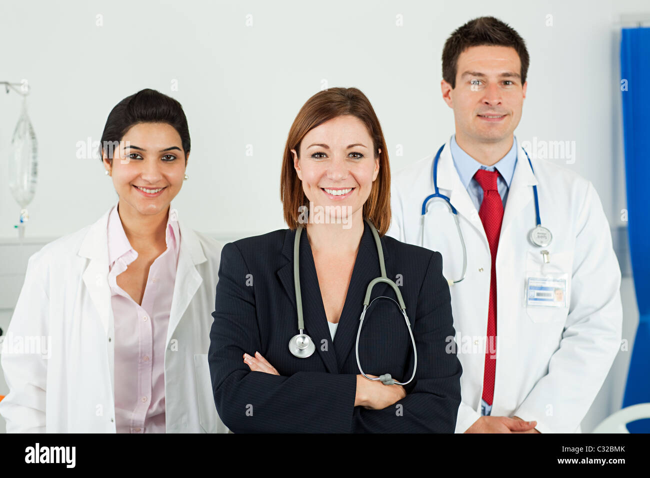 Portrait of three doctors Stock Photo - Alamy