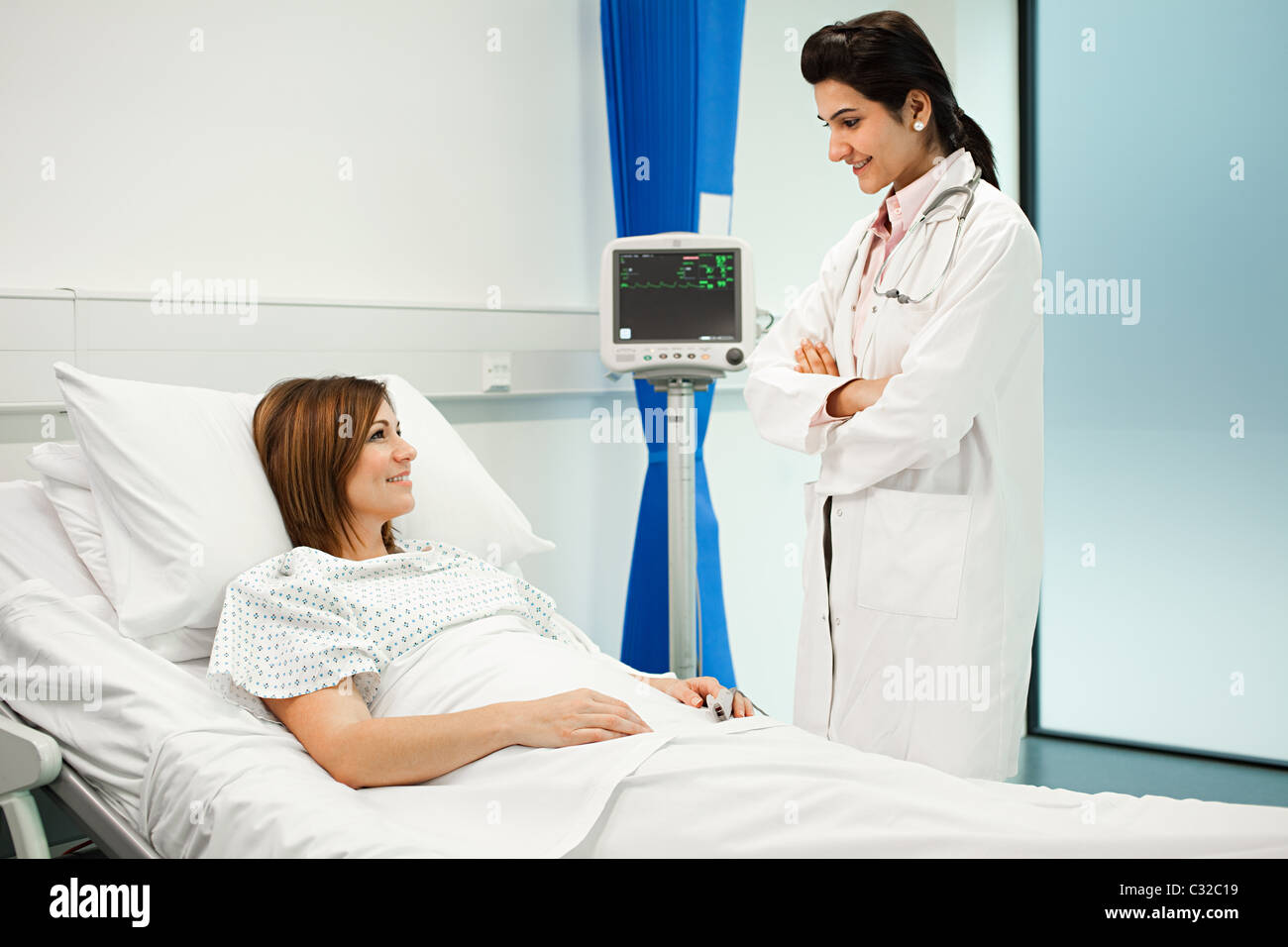 Female patient with doctor Stock Photo - Alamy
