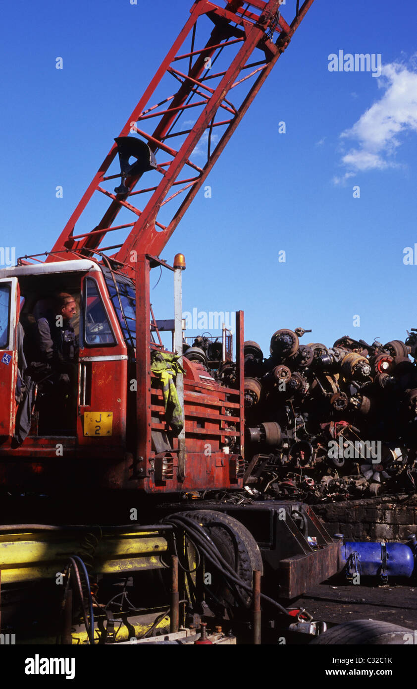 driver operating crane at scrapyard uk Stock Photo - Alamy