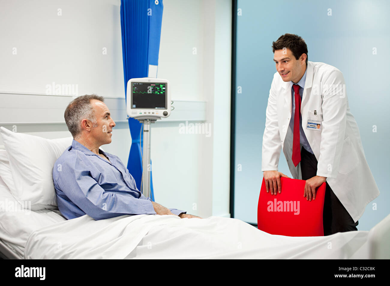 Male patient with doctor Stock Photo - Alamy