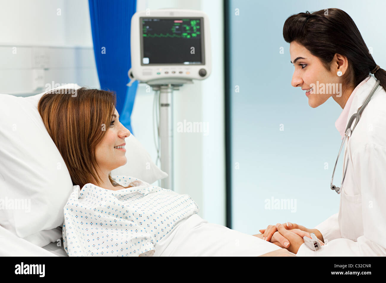 Female patient with doctor Stock Photo - Alamy