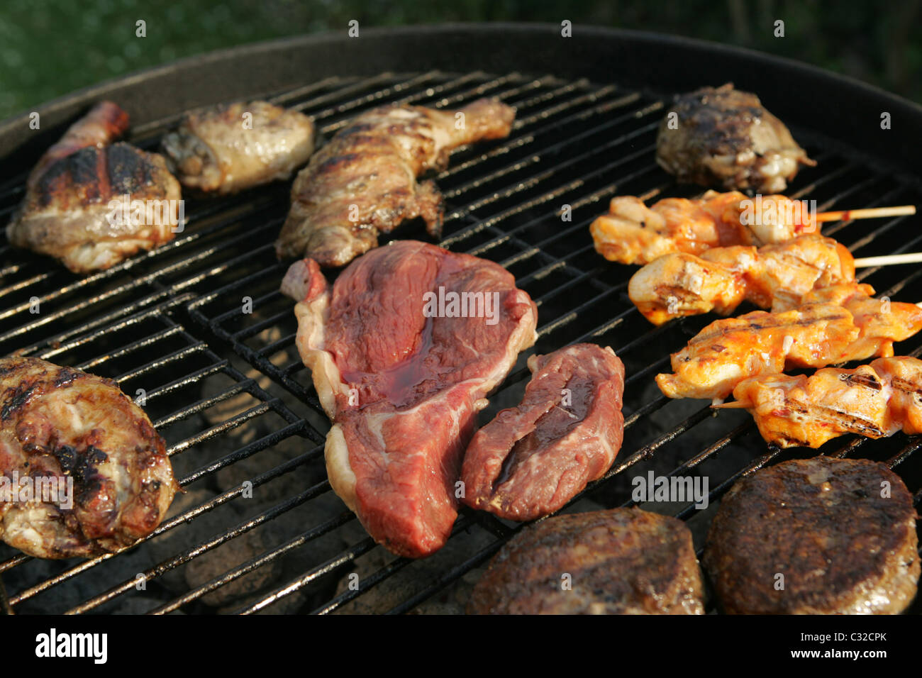 BBQ - Selection of meats steak in focus Stock Photo - Alamy
