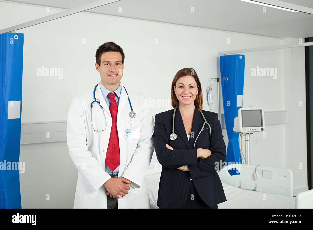 Portrait of male and female doctors Stock Photo - Alamy