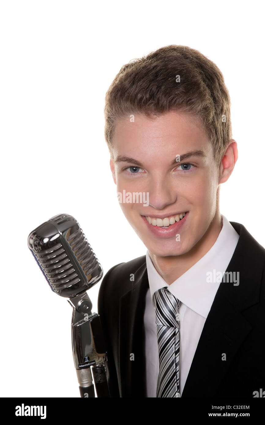 Young singer with retro mic sing karaoke Stock Photo - Alamy