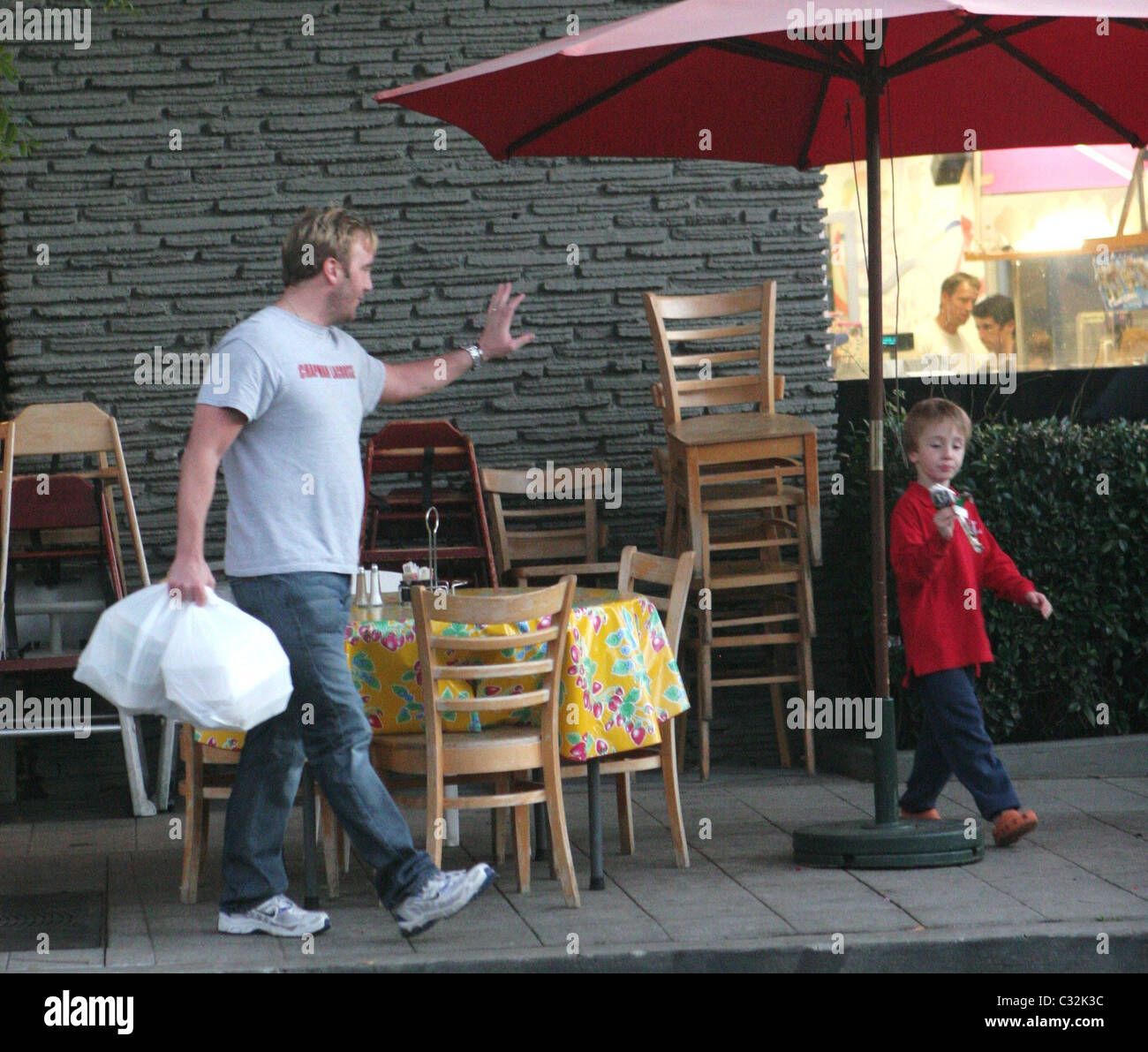 Jay Mohr and his son Jackson pick up some carry out food to go at ...