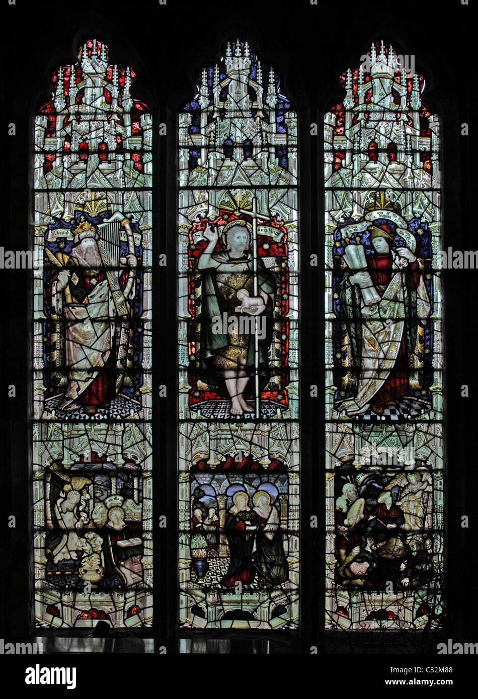 A stained glass window by C E Kempe & Co. depicting King David, St John ...