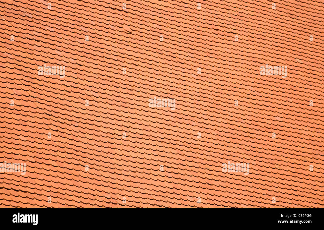 Orange tile roof Stock Photo - Alamy