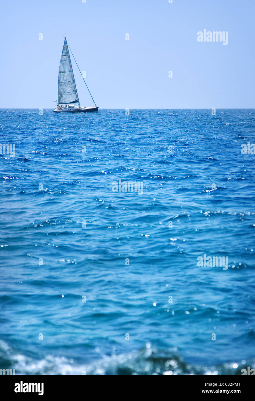 A small boat sailing on a sunny day Stock Photo - Alamy