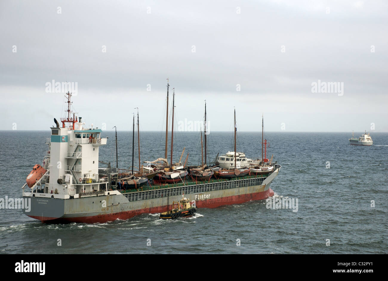 The Flinterduin ship from Groningen loaded with traditional boats of ...