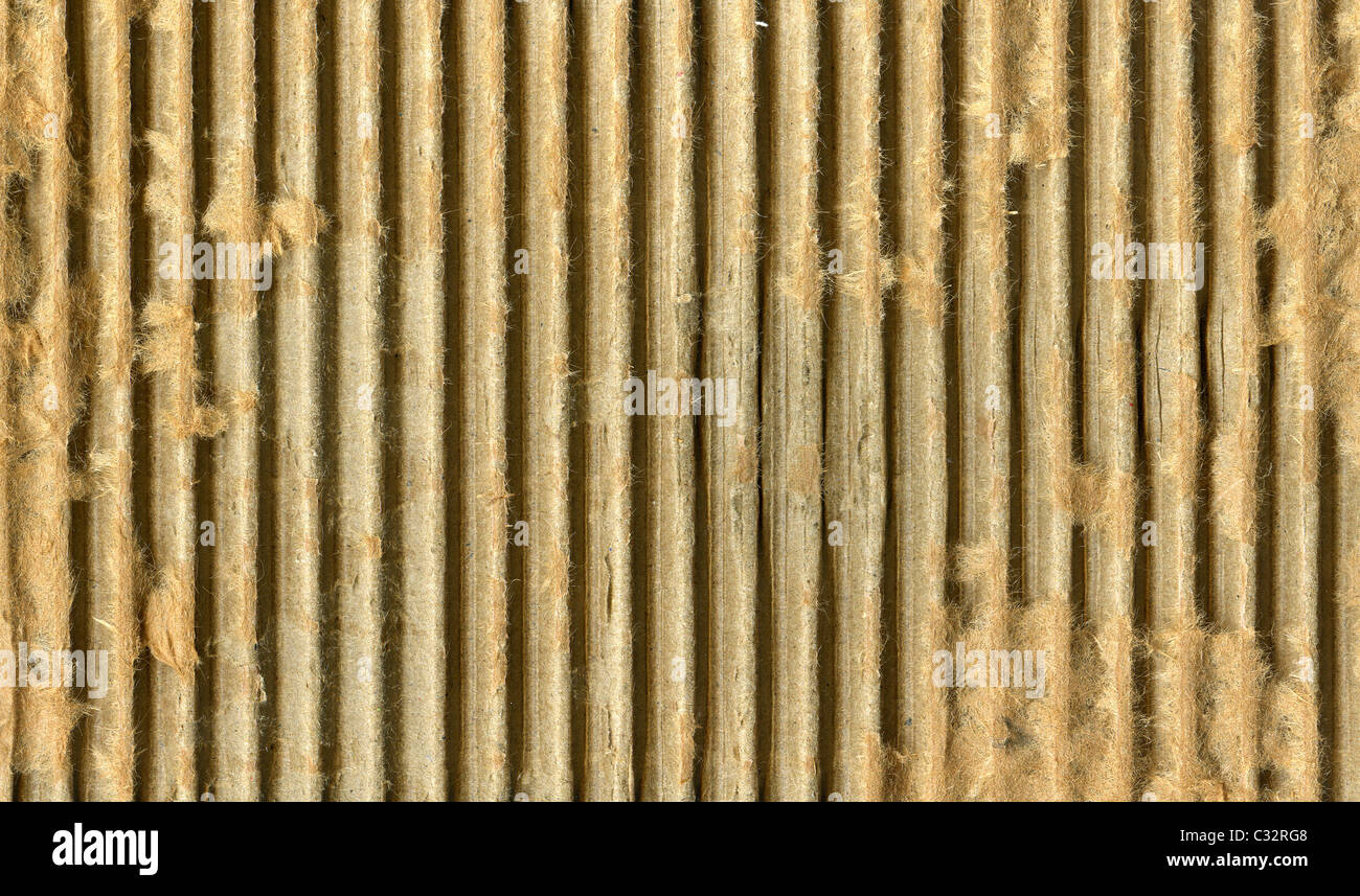 Textured corrugated striped cardboard with natural fiber parts Stock ...