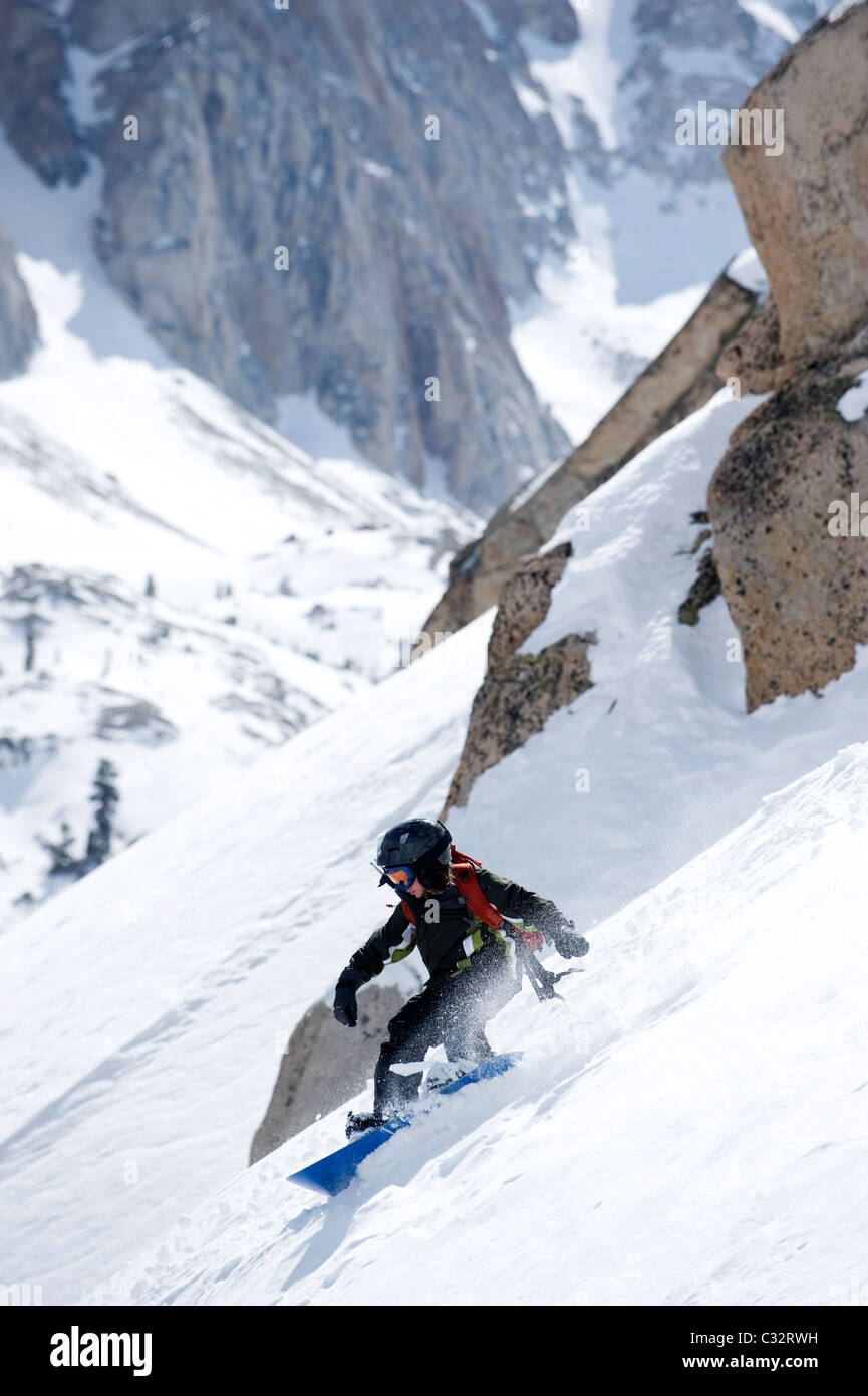 A boy snowboarding in the California backcountry Stock Photo - Alamy