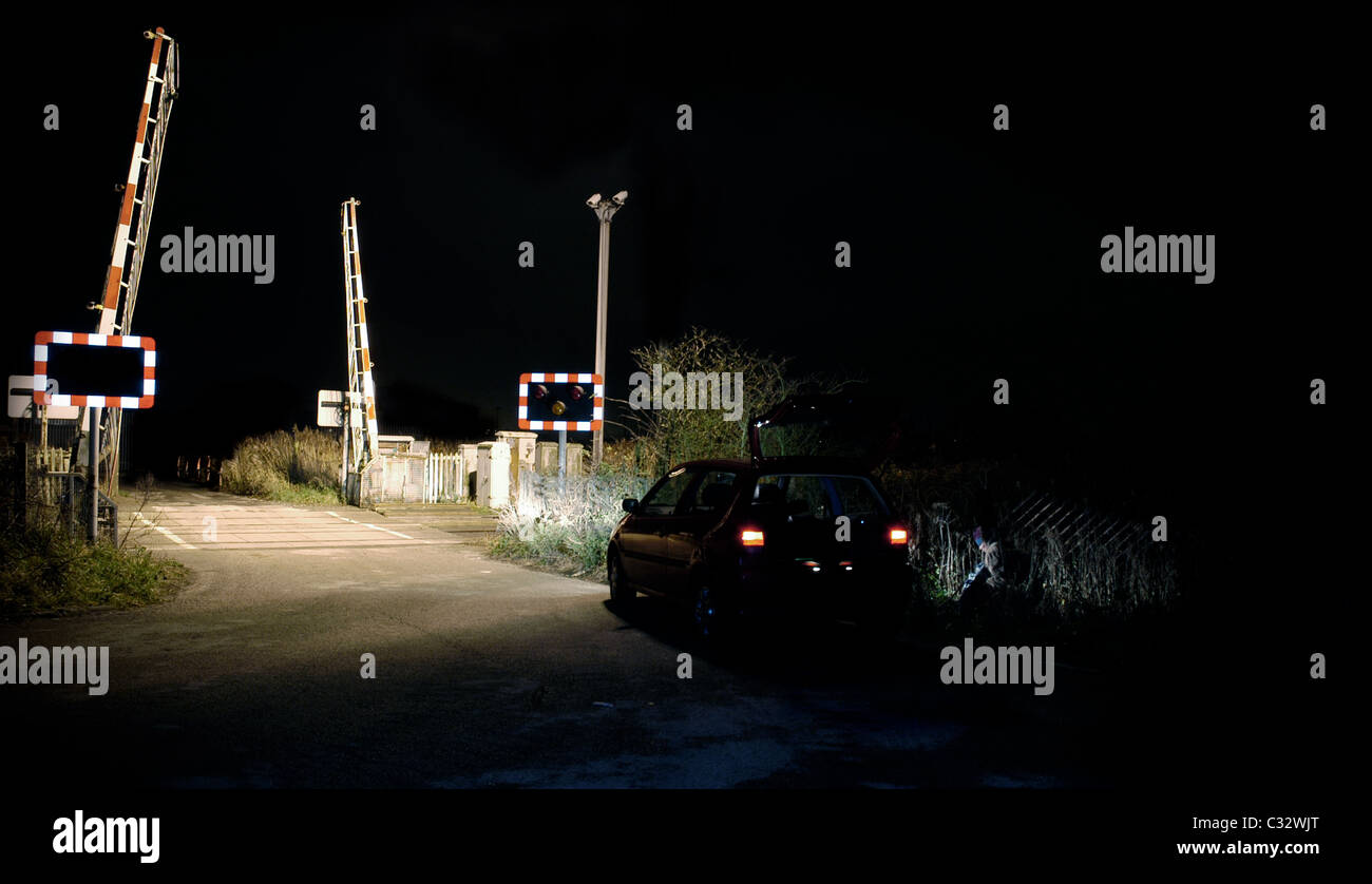 Level Crossing on railway lines Stock Photo - Alamy