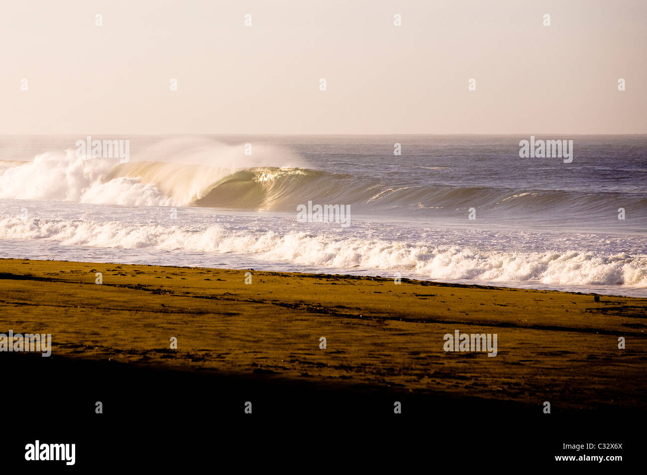 A large set wave barrels in at Westward Beach in Malibu, California ...