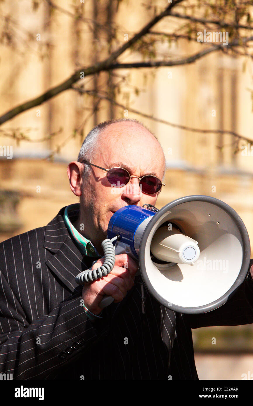 Anarchist Ian Bone heckles MPs giving media interviews on Budget Day ...