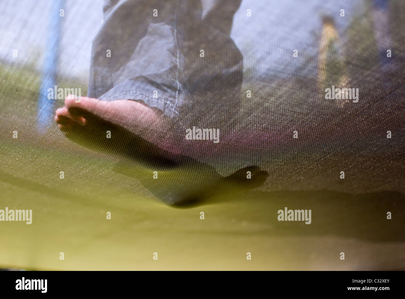 Underneath of feet on trampoline,foot, bare, foot, sole, step,abstract ...
