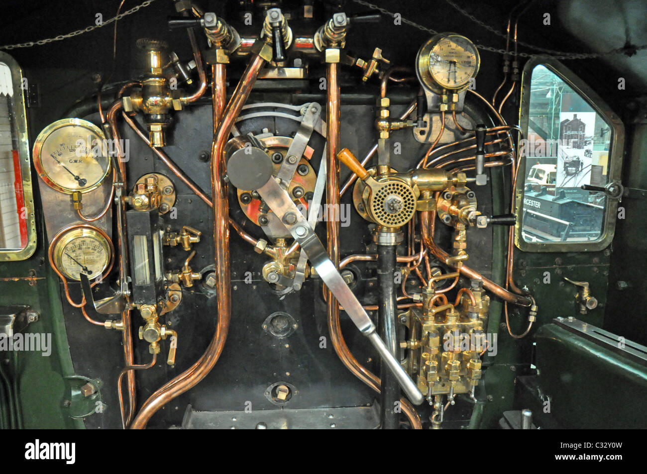 Steam locomotive footplate at STEAM Museum. NOTE figure is a model and ...