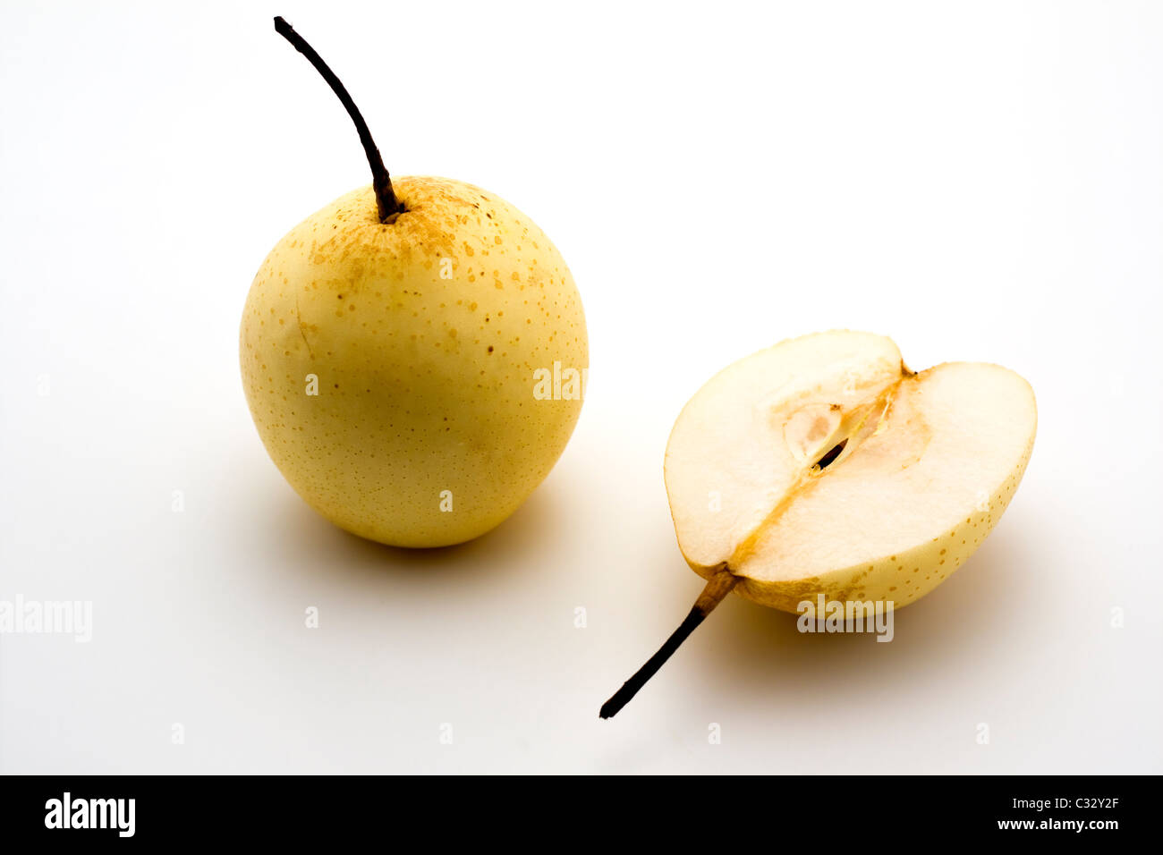 Nashi pear on white background Stock Photo - Alamy