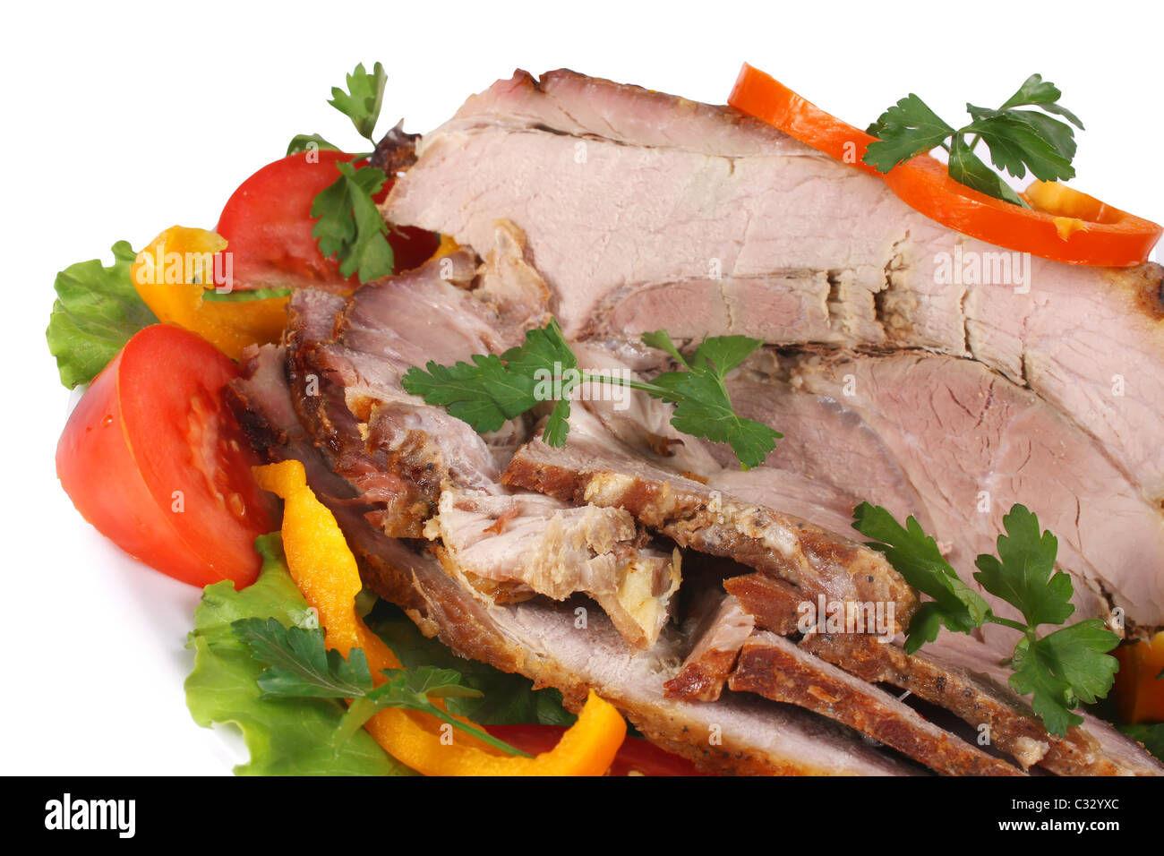 fried meat with vegetables isolated on white background Stock Photo - Alamy
